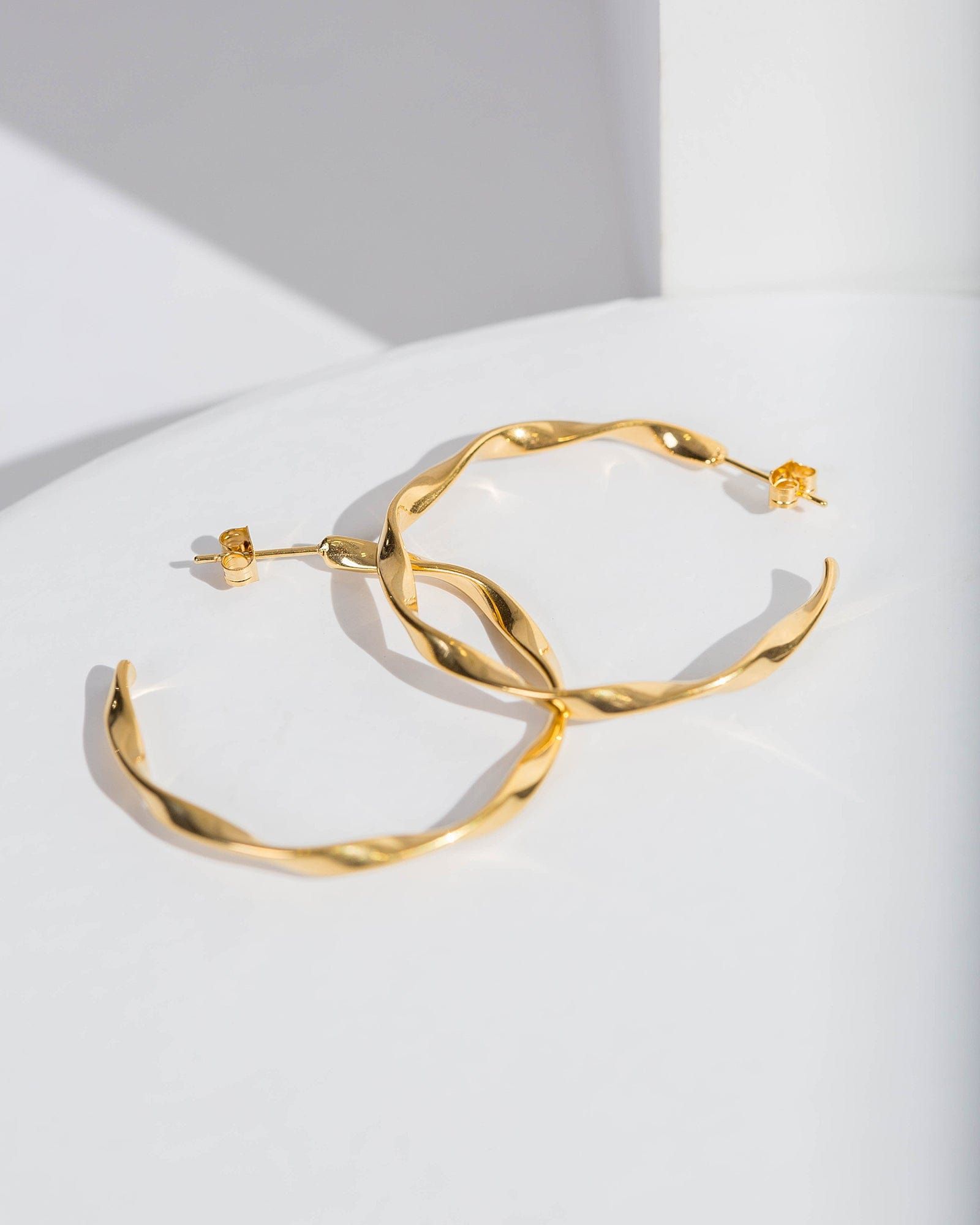 Gold Wavy Hoop Earrings | Parallel