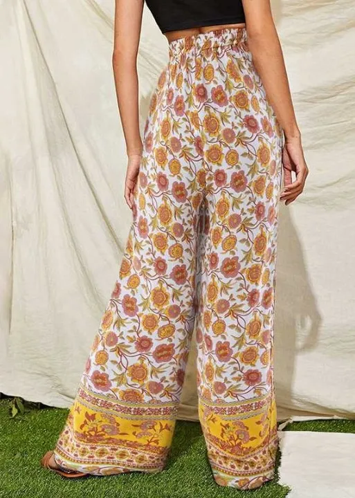 Boho flowing palazzo pants Orange hippie with pattern | Parallel